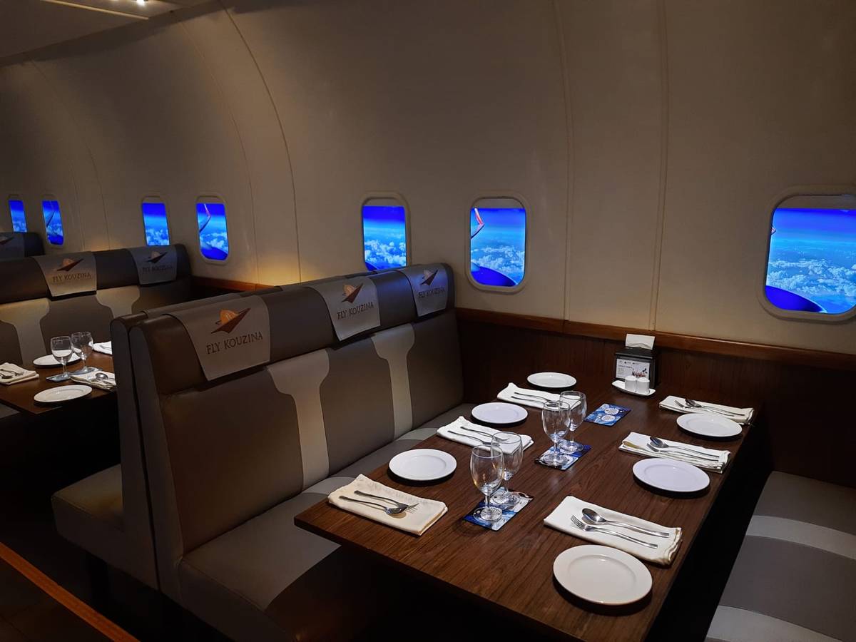 An aircraft-themed restaurant that even issues you a boarding pass to ...